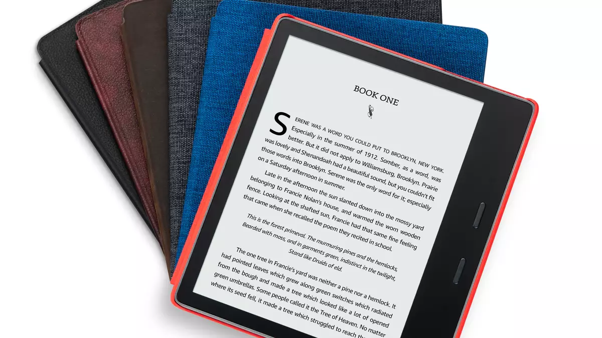 O Kindle Oasis em cima de cinco capas coloridas para o aparelho.