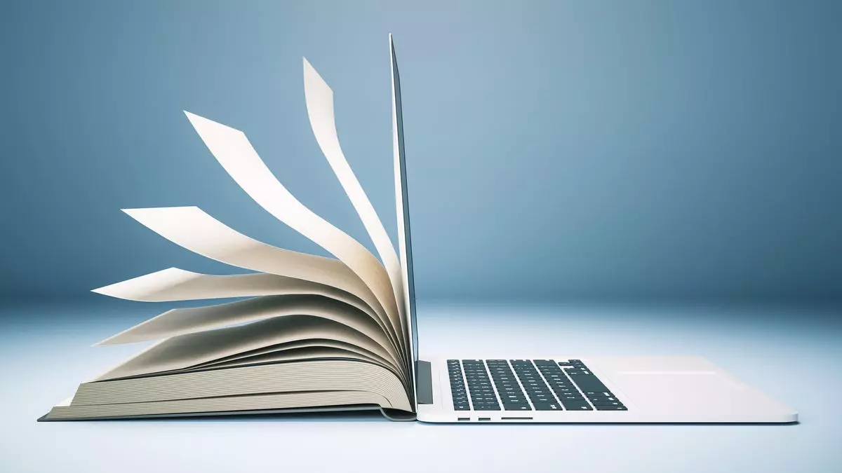 En bärbar dator som sakta förvandlas till en bok.