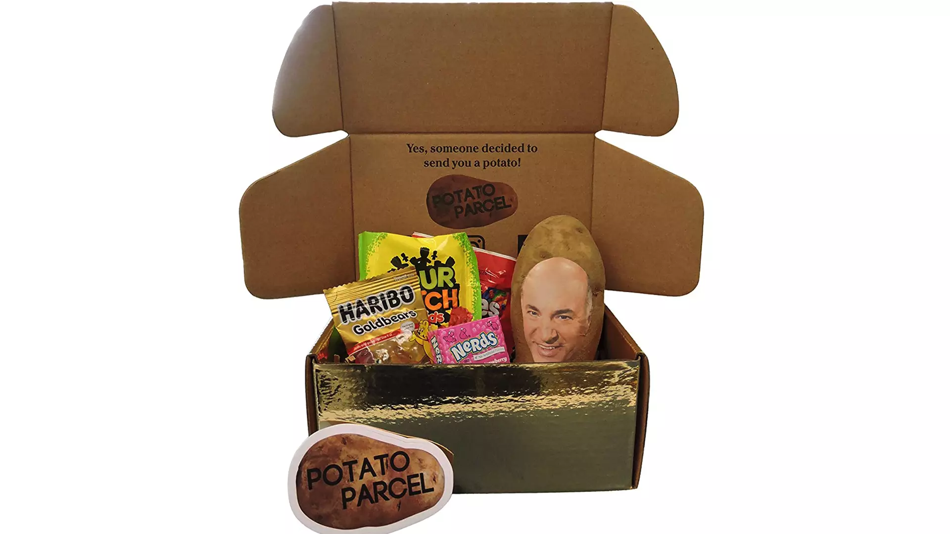 Bulvių siuntinys --- dėžutė, pilna saldainių ir bulvė su kažkieno galva.