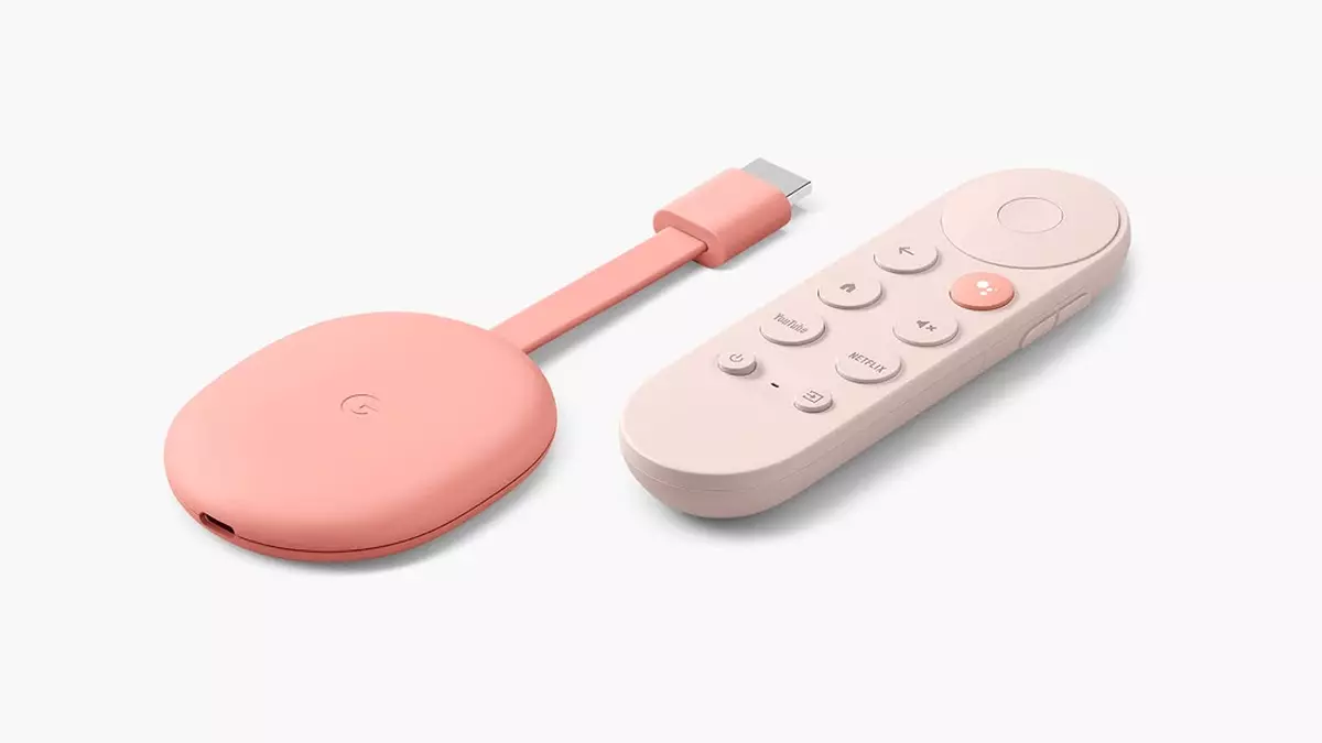 帶有 Google TV 加密狗和遙控器的粉色 Chromecast 的照片。