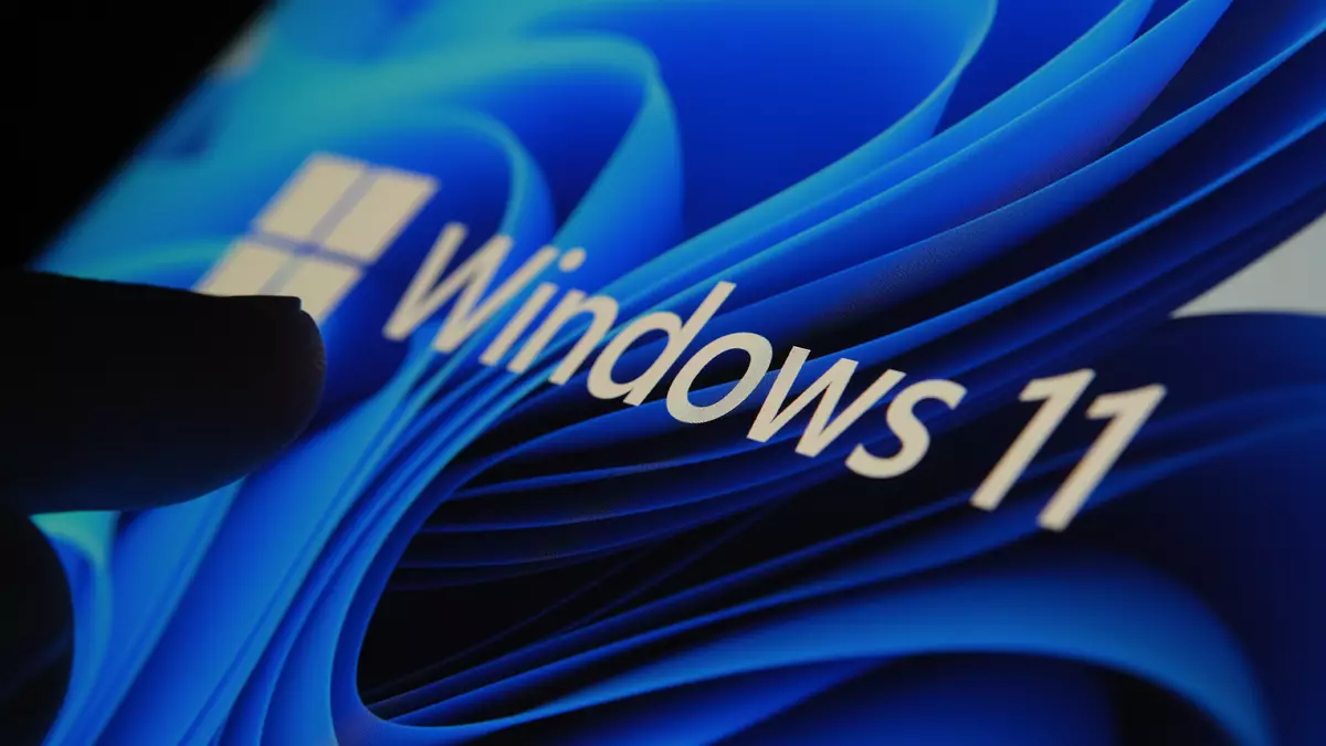 Windows 11 ar ríomhaire glúine touchscreen.