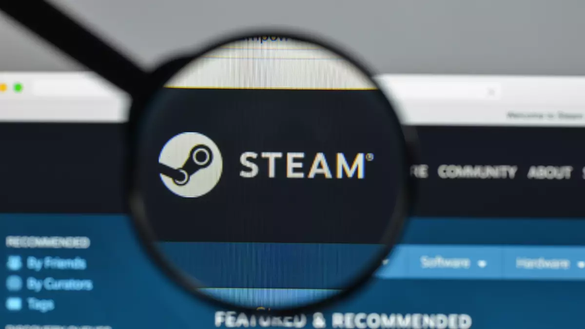 Kaca pembesar di atas logo Steam.