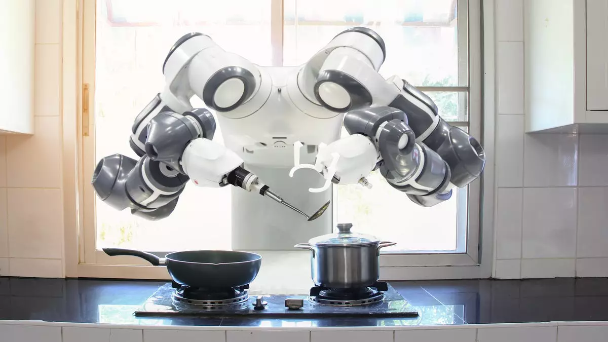 Өглөөний хоол хийж буй робот