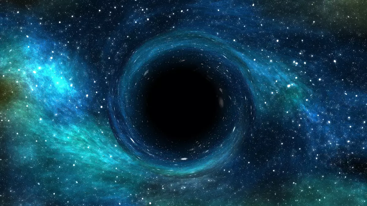 Црна рупа изнад звезданог поља у свемиру