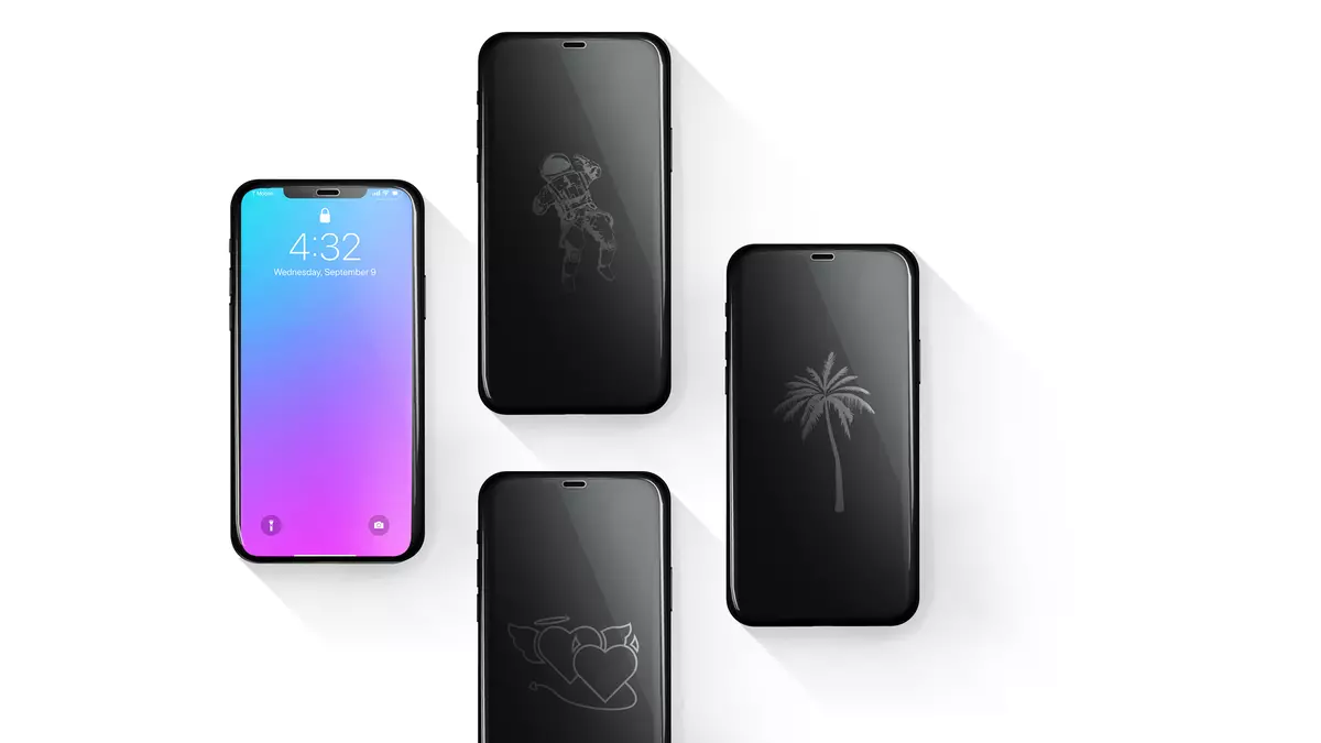 Cztery telefony z grafikami wyświetlanymi na ekranach do spania.