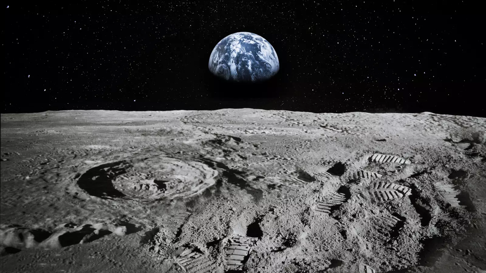 Vista do membro da Lua com a Terra subindo no horizonte