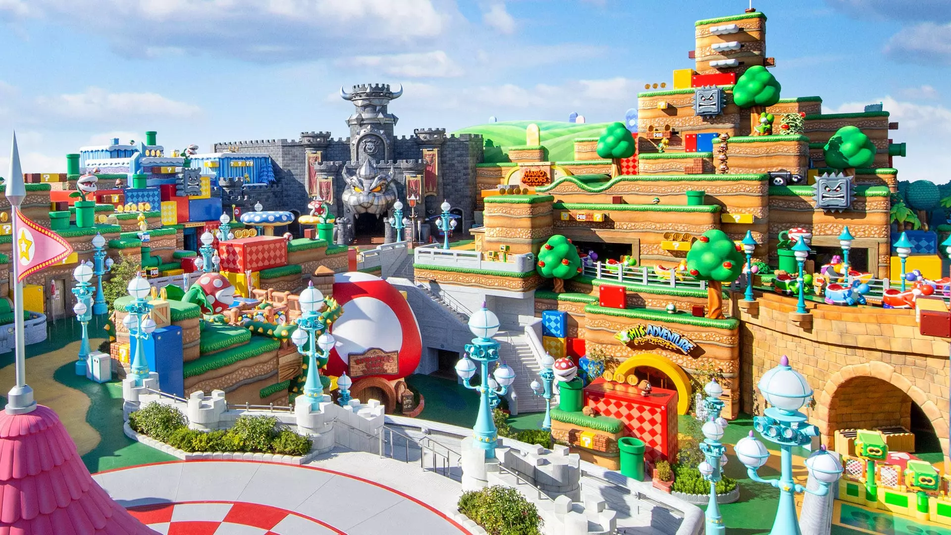 日本の任天堂テーマパークが2月にオープンし、ヨッシーとマリオカートの乗り物があります