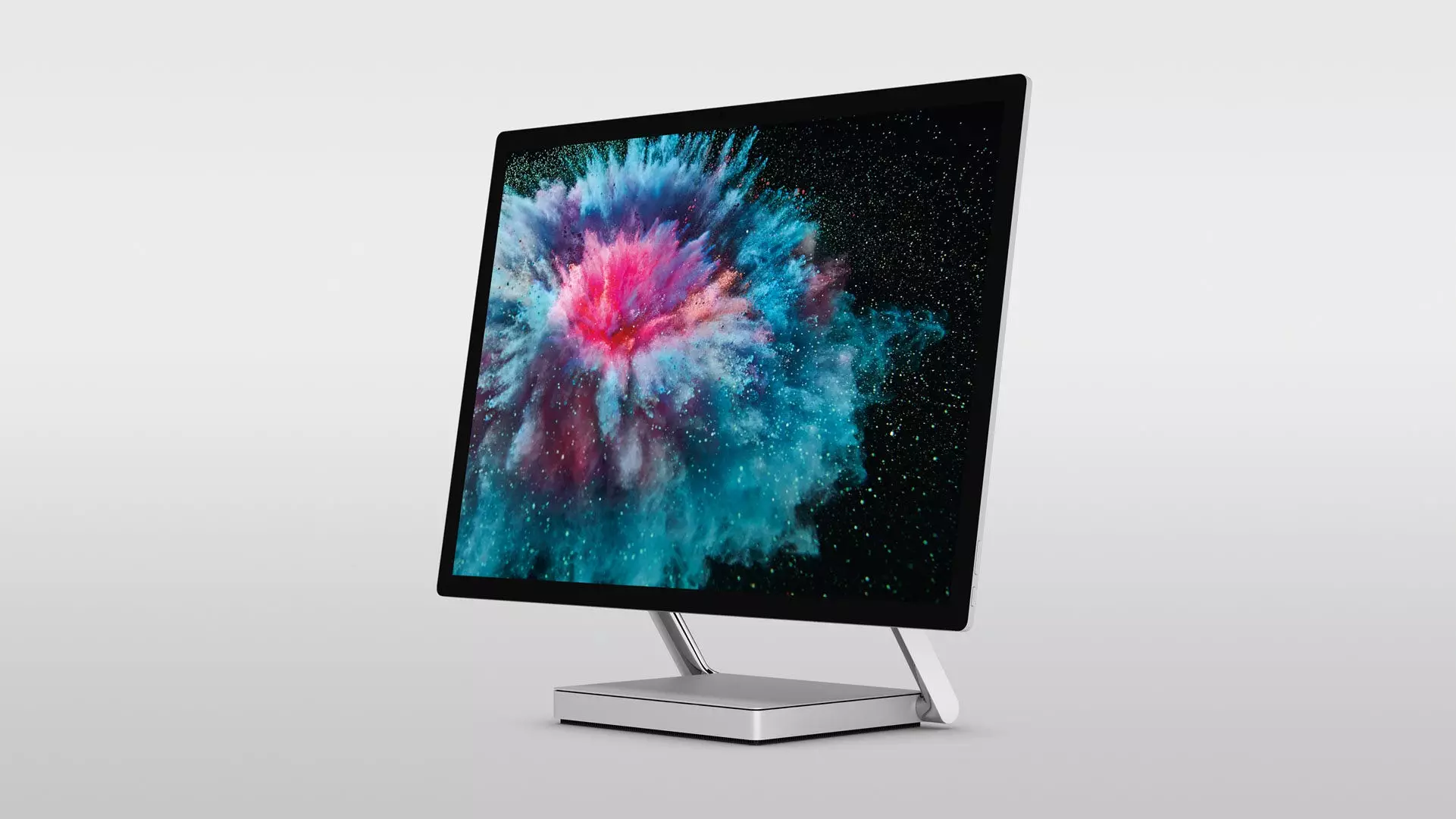 Et Surface Studio 2 på en grå bakgrunn