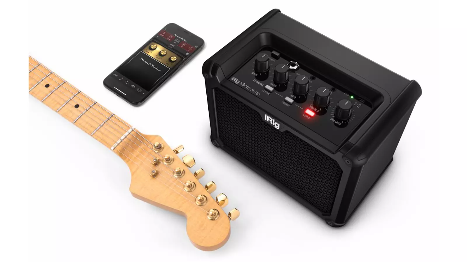 IK Multimedia iRig Micro Amp nga adunay gitara ug smartphone