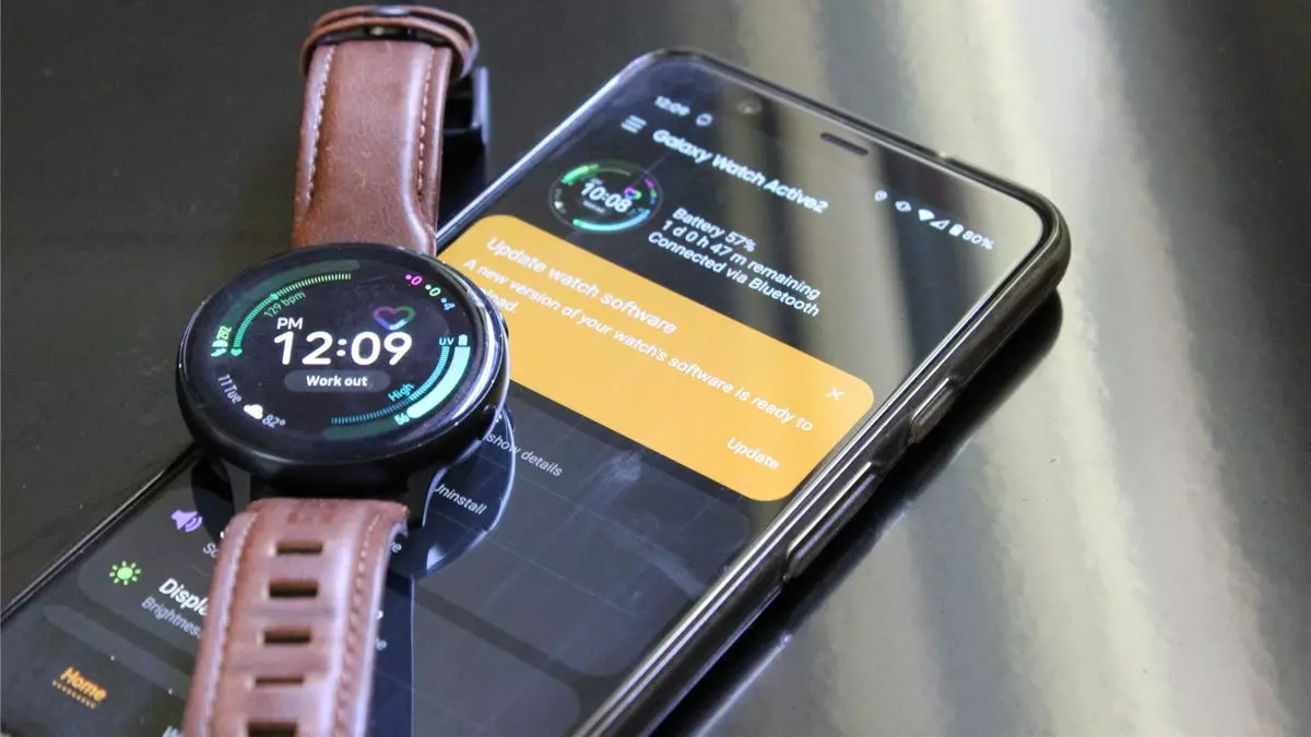 Samsung Galaxy Watch Active 2 သည် Pixel 4 XL ၏ထိပ်တွင်တင်ထားသည်။