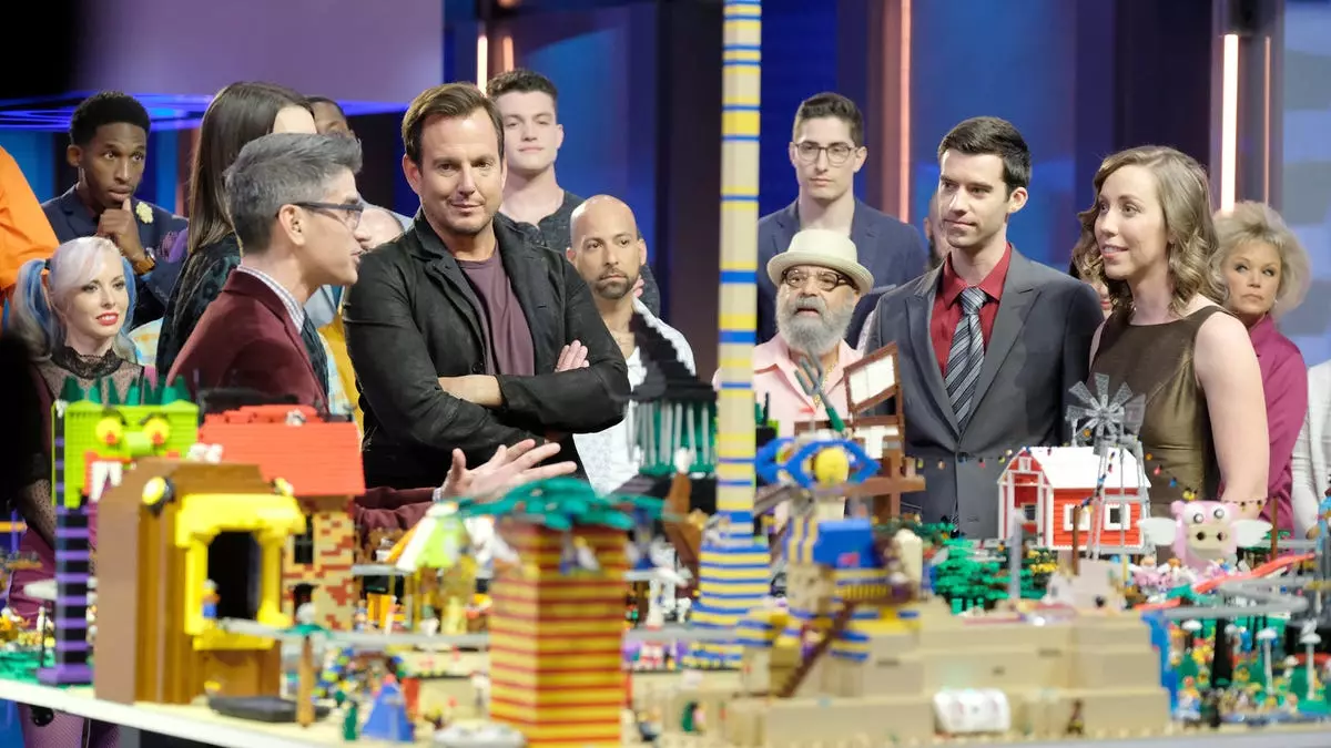 'LEGO मास्टर्सको मूल कलाकार लेगो ईंटहरूले भरिएको टेबलको वरिपरि उभिएको।