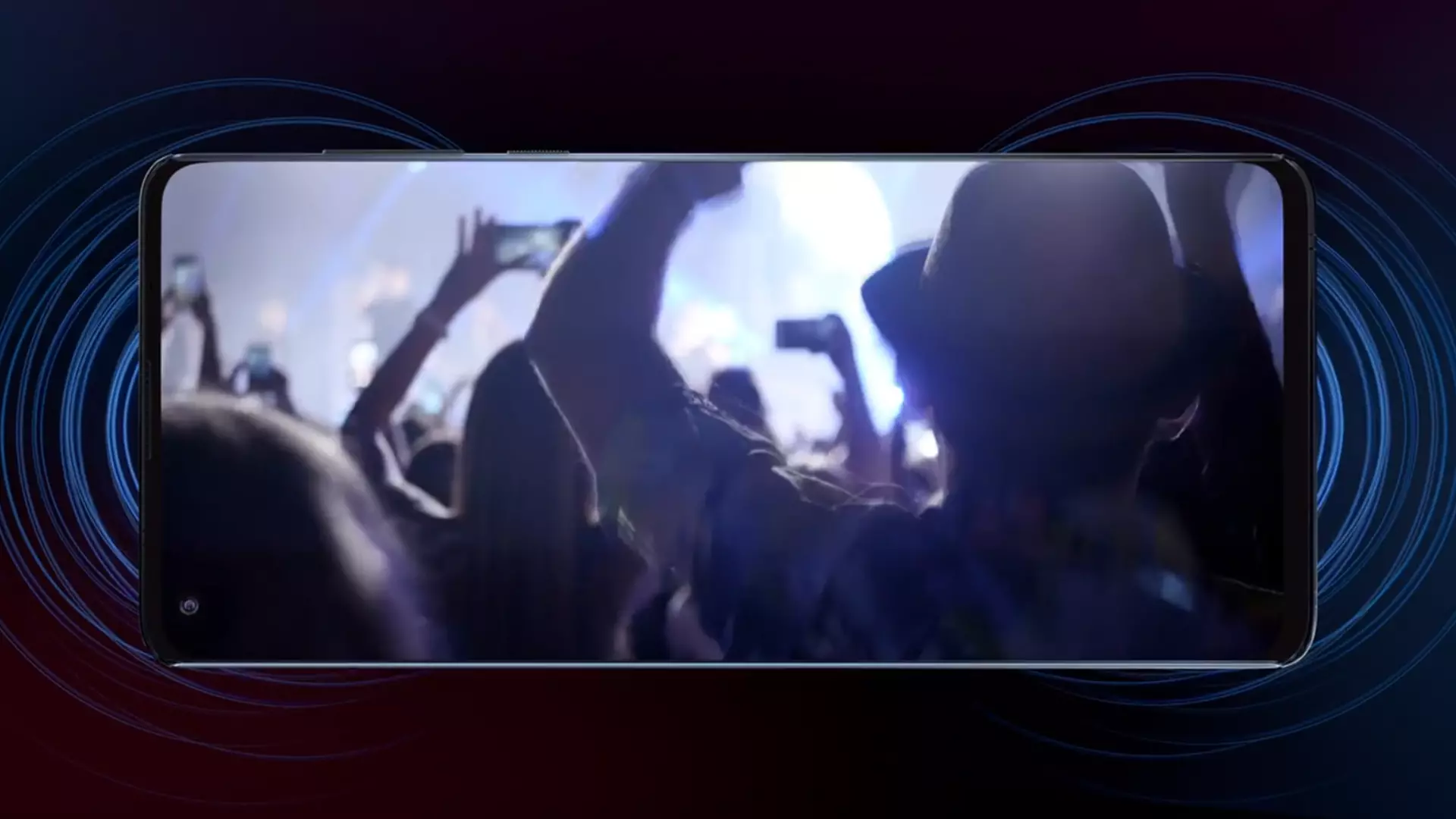 Motorola Edge で撮影されているライブ コンサートの観客。