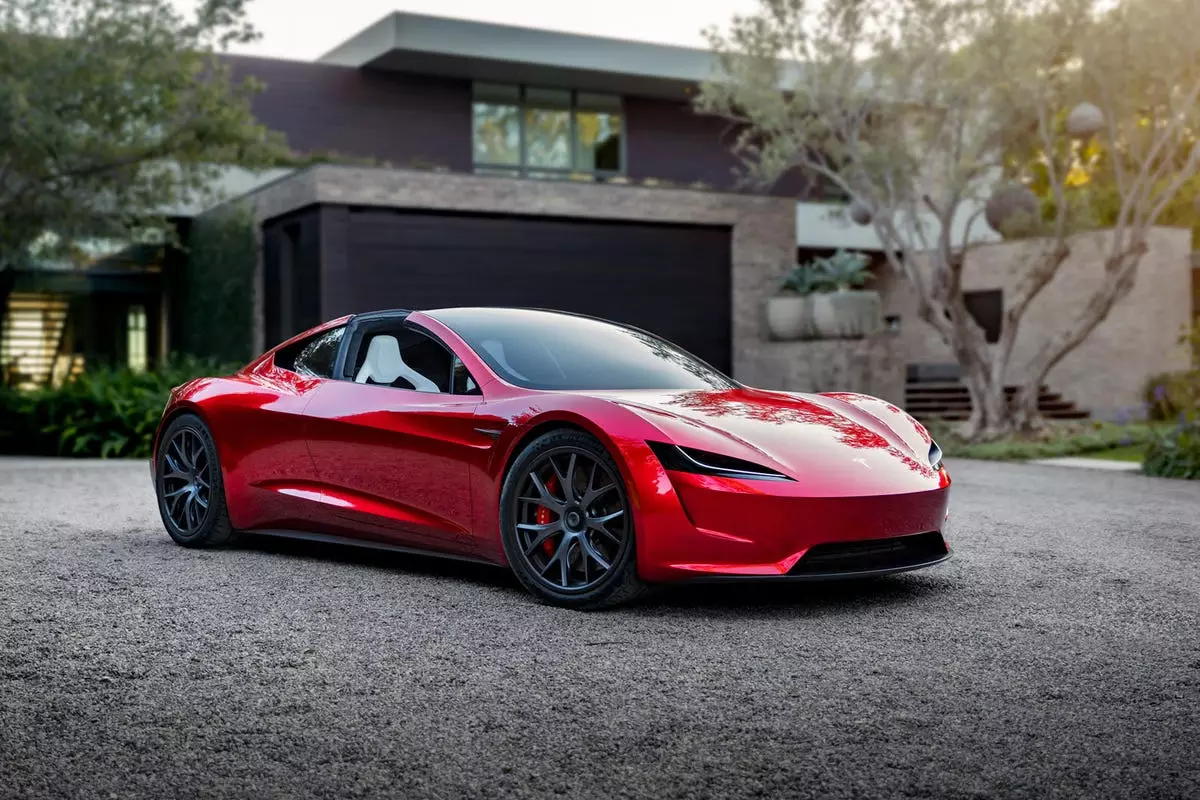 I-New Tesla Roadster in a driveway