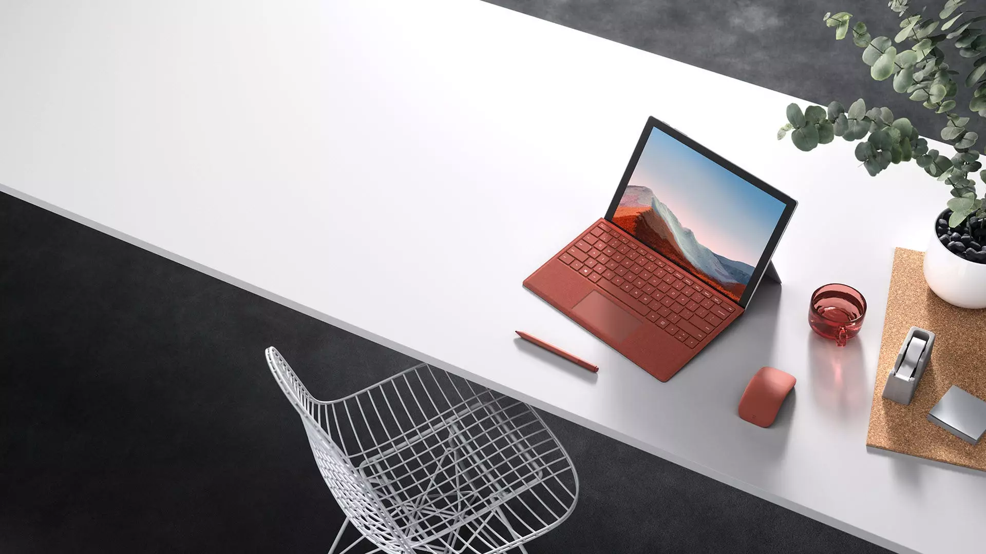 En Surface Pro X på et skrivebord.