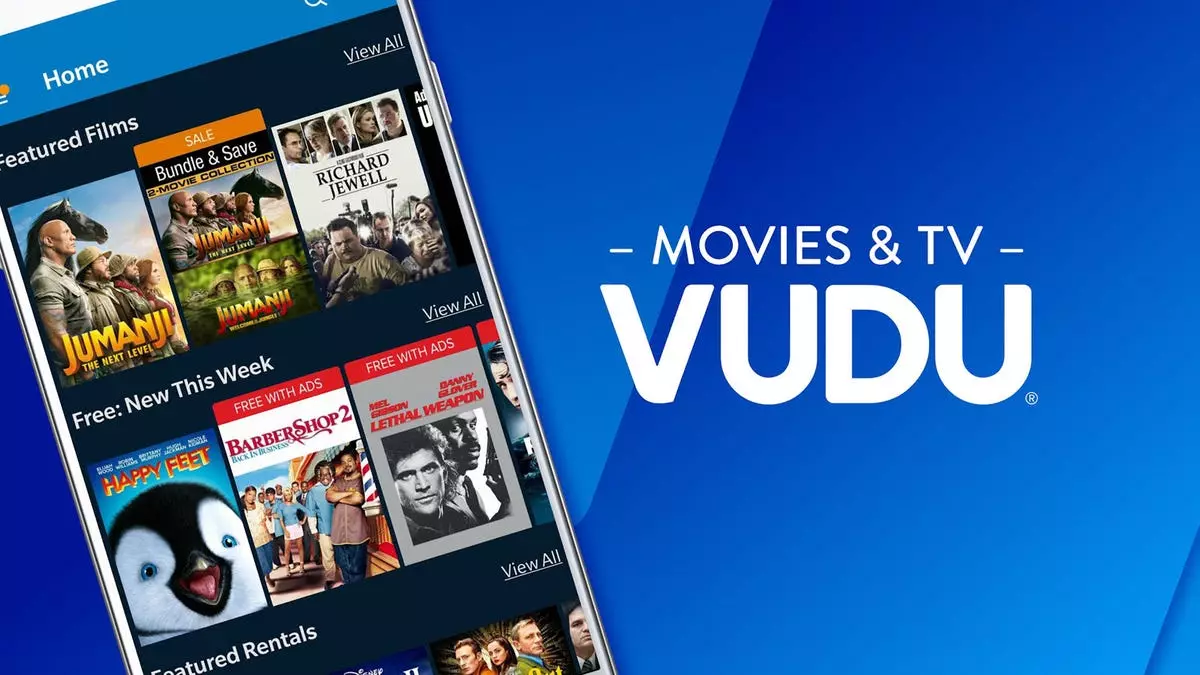 Vudu-loggen ved siden af en telefon, der kører Vudu-appen med Jumanji-videoer.