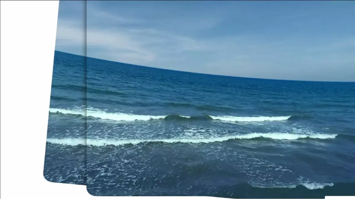 Nagovještaj dva zaslona spojena na T-šarkama koji prikazuju valove oceana.
