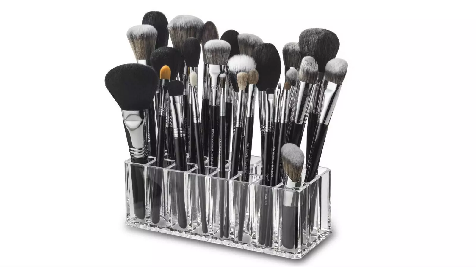 ByAlegory Acrylic Makeup Brush Organizer, kuriame yra įvairių formų ir dydžių šepetėliai.