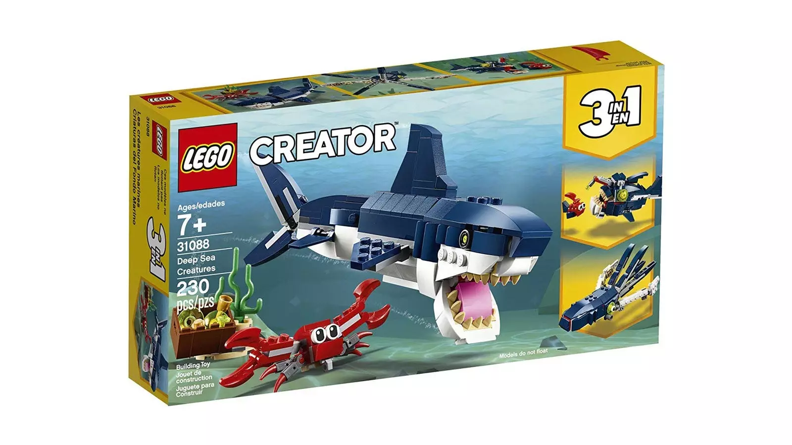 O cutie LEGO 3-în-1 cu un rechin, un pește rapișor și un calmar.