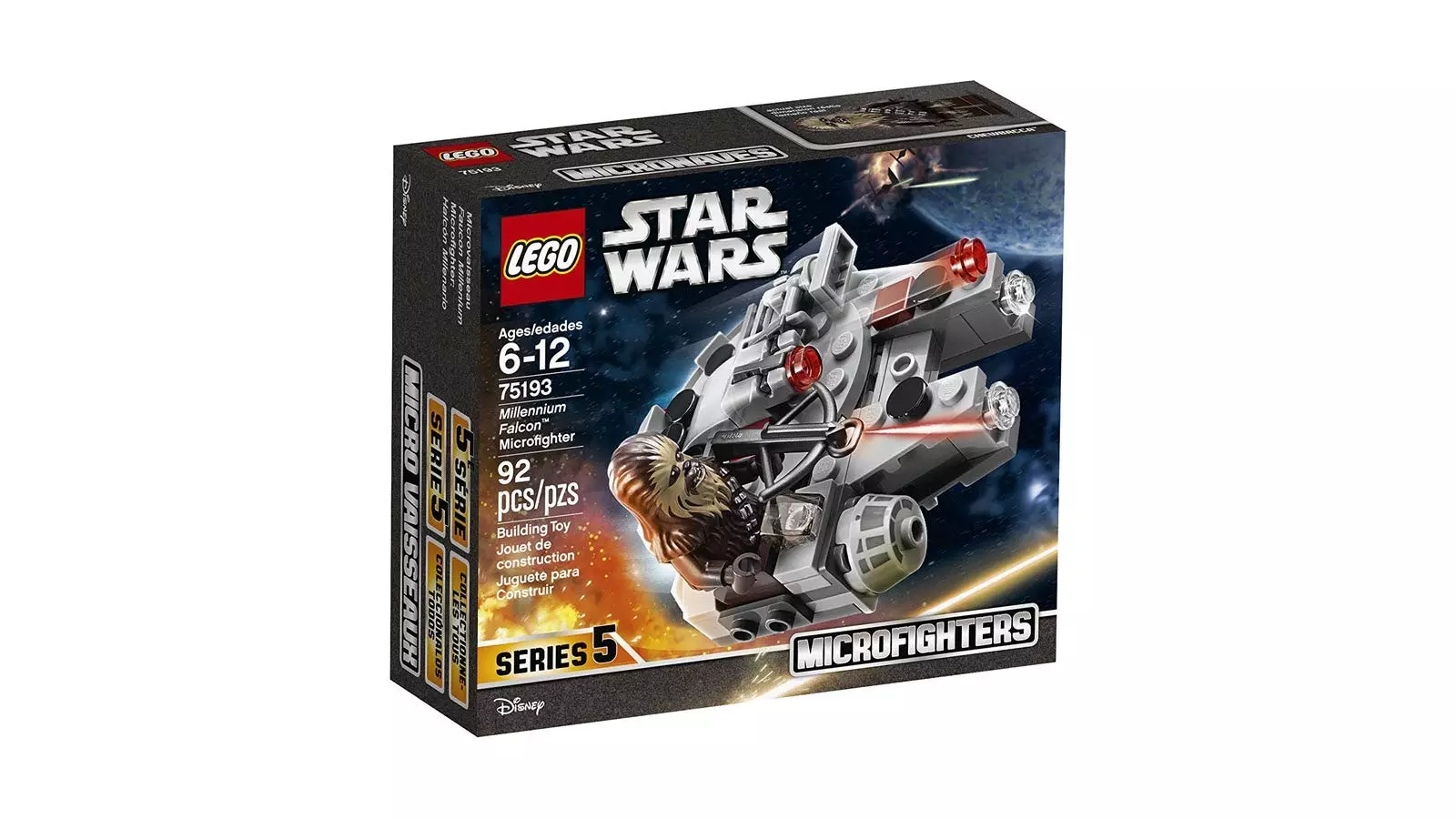 Une boîte avec LEGO Chewbacca chevauchant un Lego Millennium Falcon