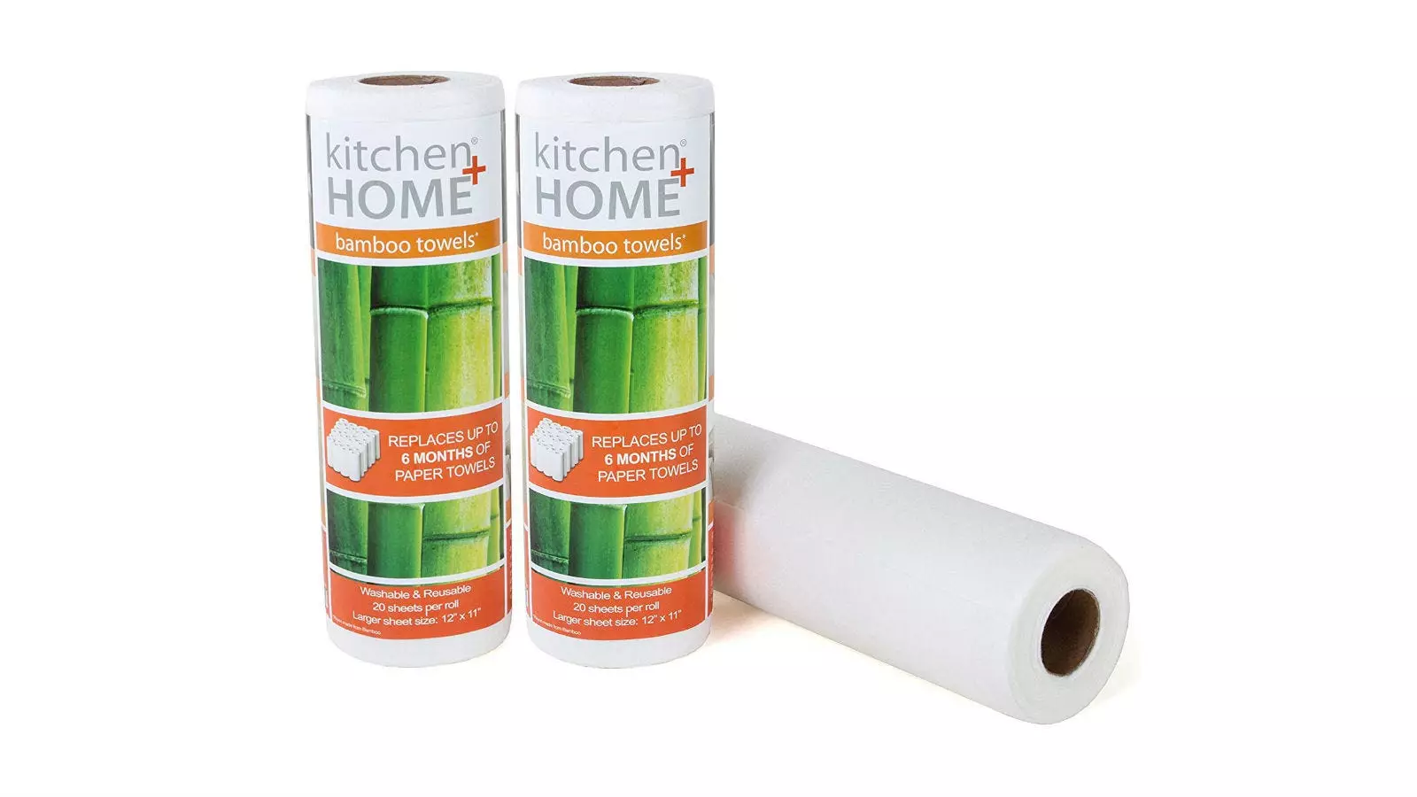 Duha ka rolyo sa Kitchen + Home Bamboo Towels sa ilang putos, ug usa ka rolyo sa pakete niini nga nahimutang sa tupad nila.