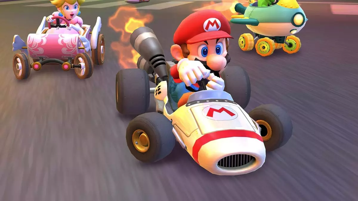 Si Mario sa isang race cart sa unahan lang ni Princess Peach sa isang pink na race kart