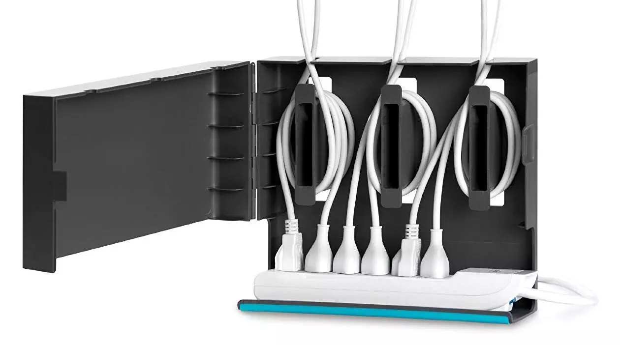 Quirky Plug Hub — это элегантный способ хранения как удлинителя, так и лишней длины шнура.