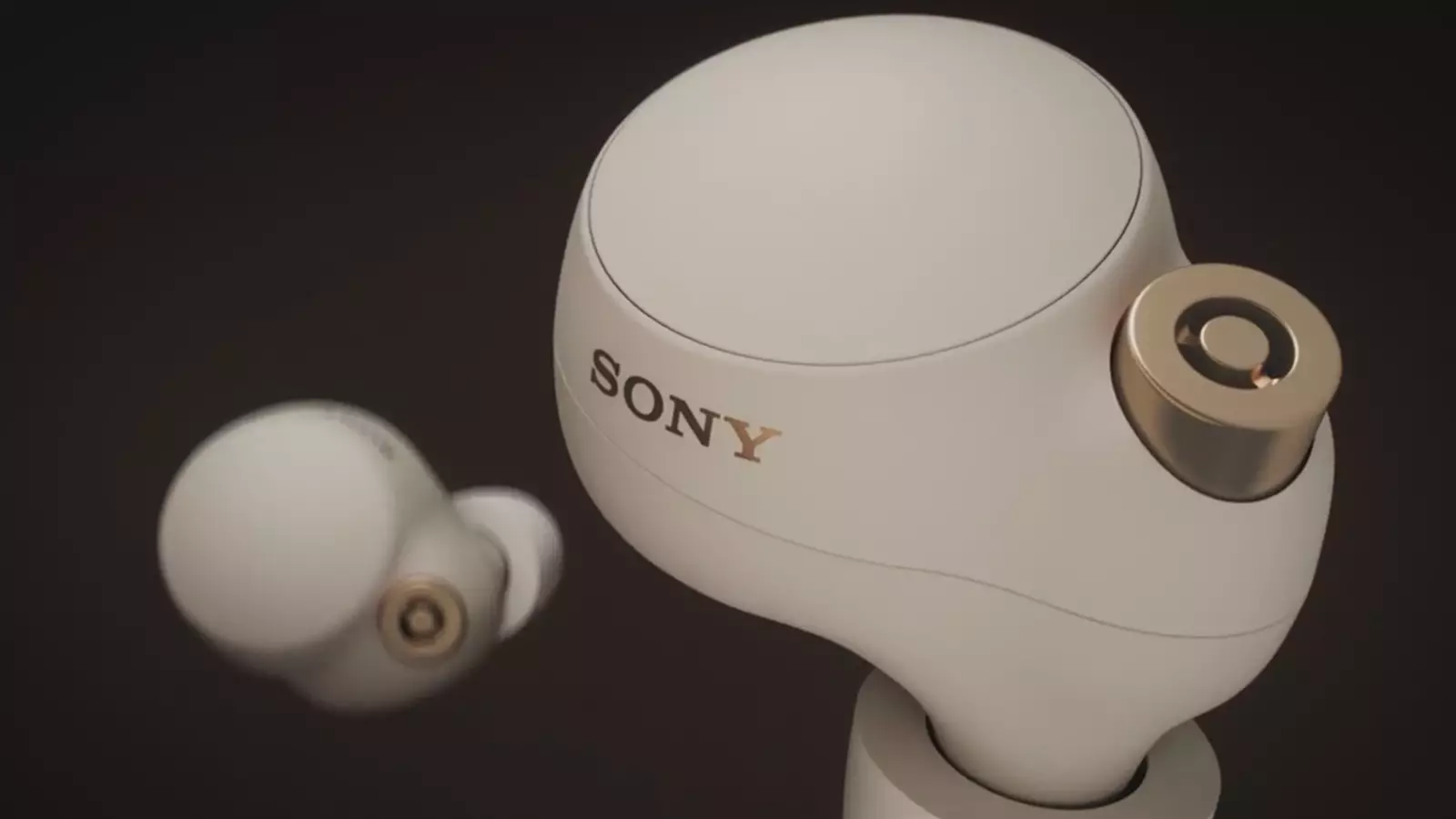 Бір Sony wf-1000xm4 құлаққапты жабыңыз, екіншісі оның артында фокусталмаған
