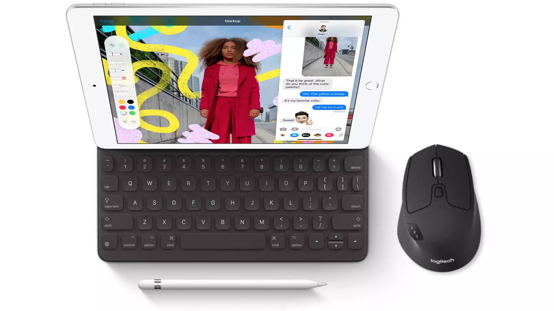 Die iPad met 'n sleutelbord, potlood en Logitech Triathalon-muis